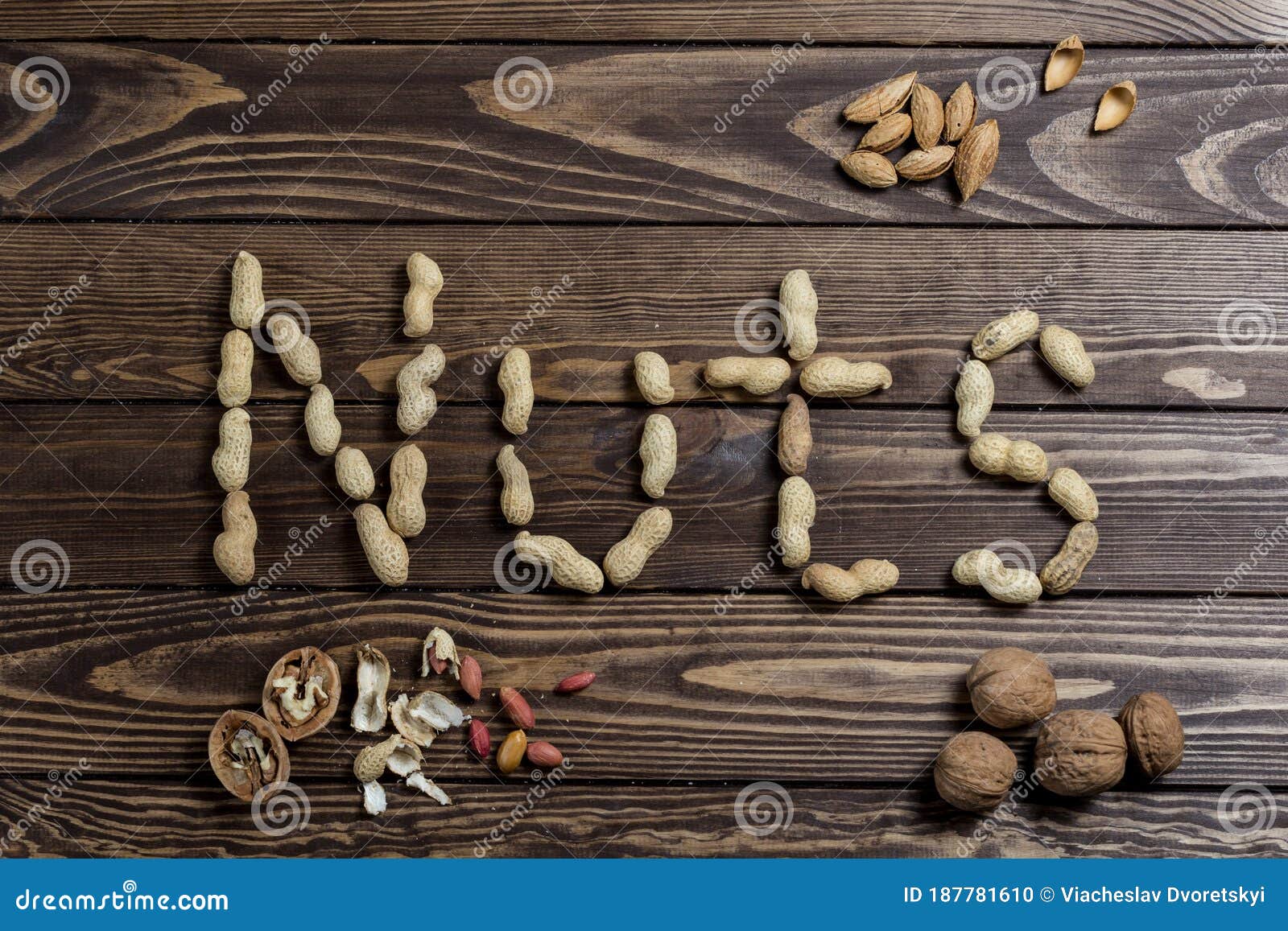 Nuts Spelling Nuts on a Wooden Table Stock Photo - Image of peanut ...
