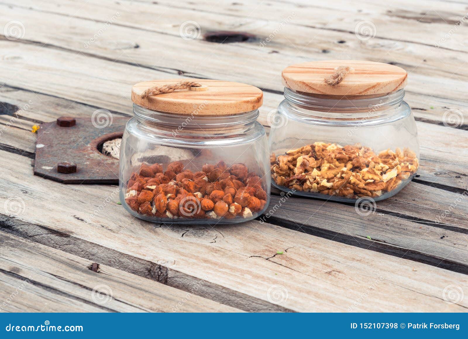 Nuts in two glass cans stock photo. Image of glass, healthy - 152107398