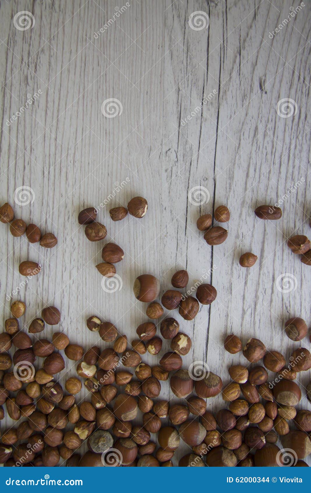 Nuts on wooden background stock photo. Image of natural - 62000344