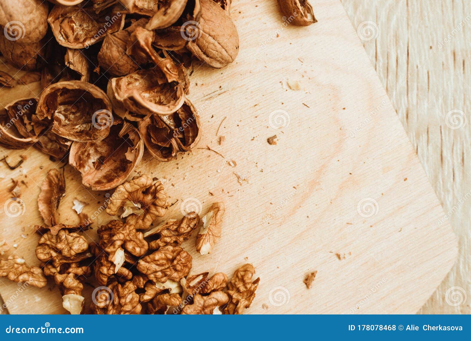 Nuts on a Wooden Board, Broken Shells. Space for Text.Whole Walnut ...