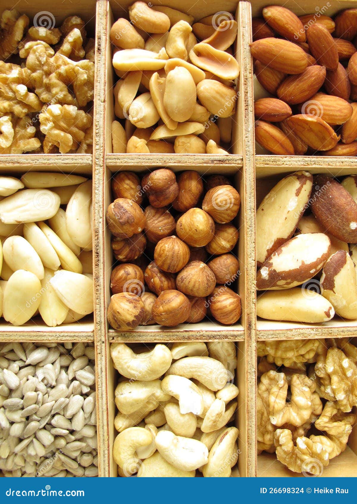 Nuts in wooden box stock photo. Image of seeds, ingredients - 26698324