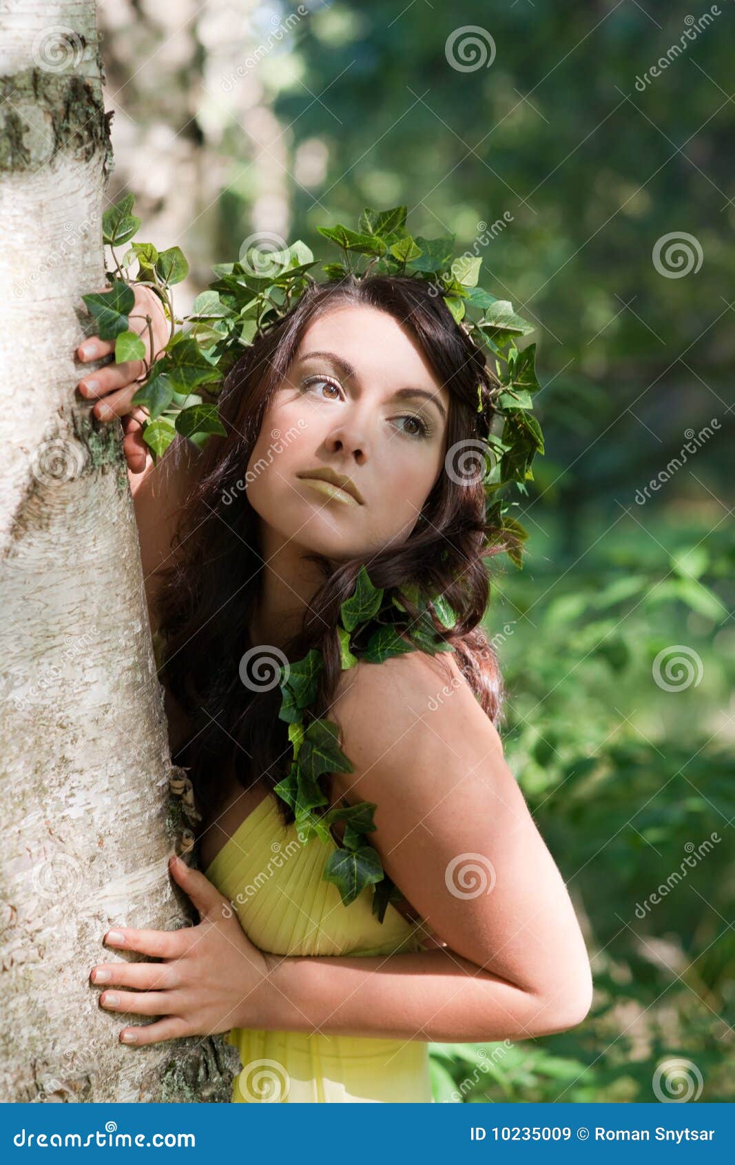 Nymph hugging a tree stock image. Image of forest, care - 10235009