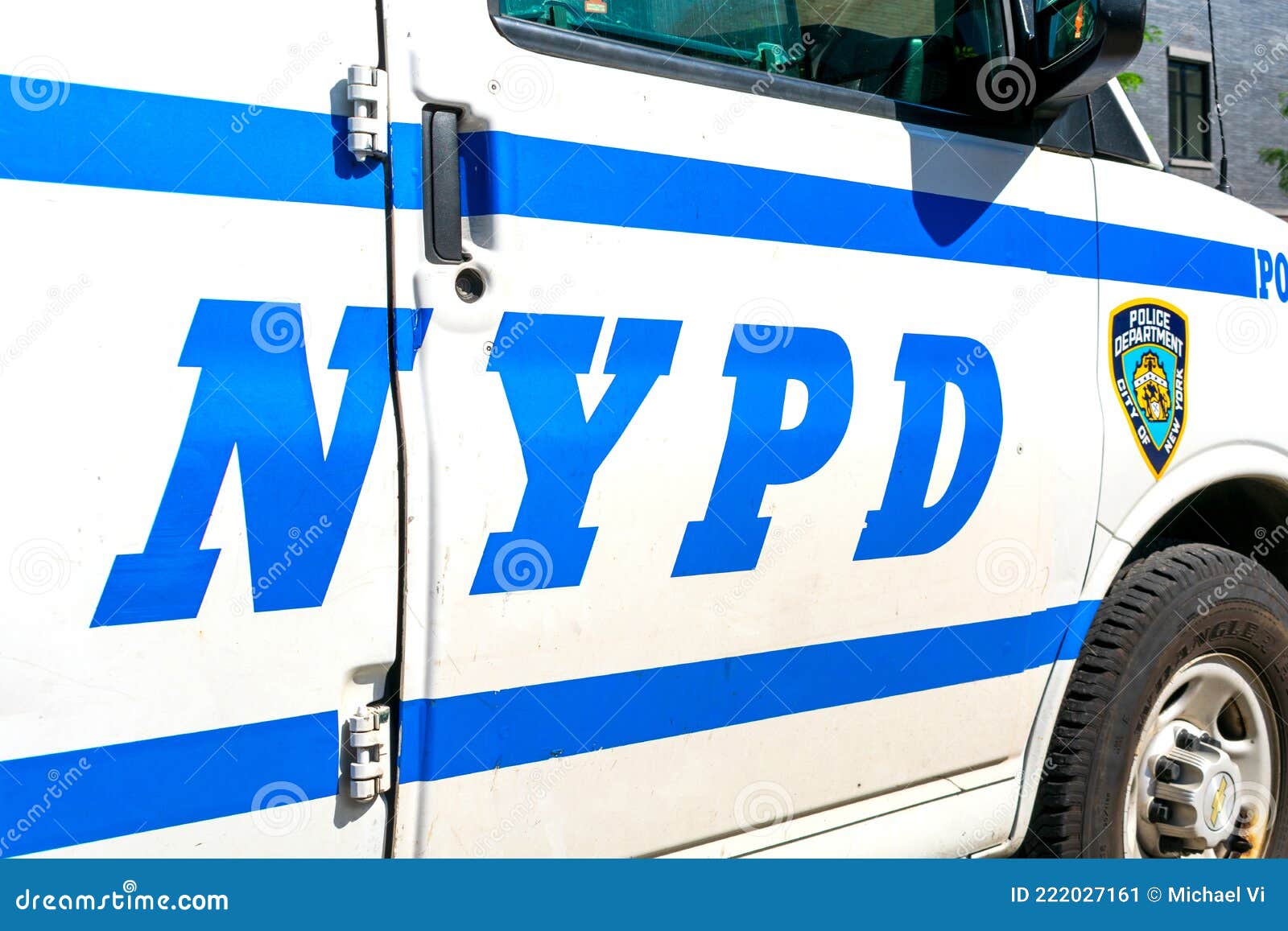 NYPD Sign and New York City Police Department Badge on the Side of ... NYPD Sign and New York City Police Department Badge on the Side of ...