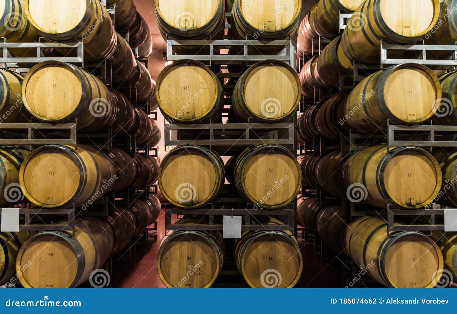 Oak Wine Barrels for Wine Fermentation at a Winery. Stock Photo - Image ...