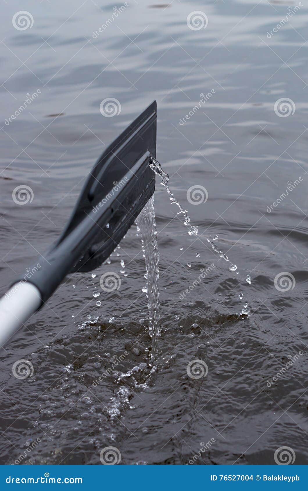 Oar in the water stock photo. Image of single, nature - 76527004