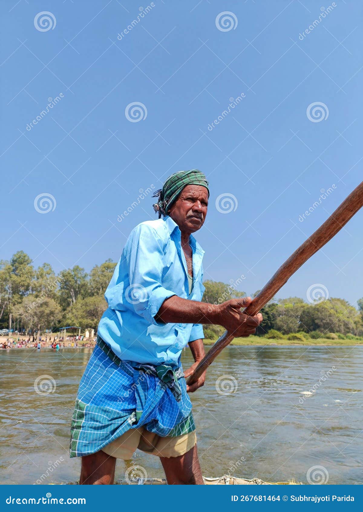 The Oarsman of a Coracle Rowing in the Waters of Cauvery in Talakadu ...
