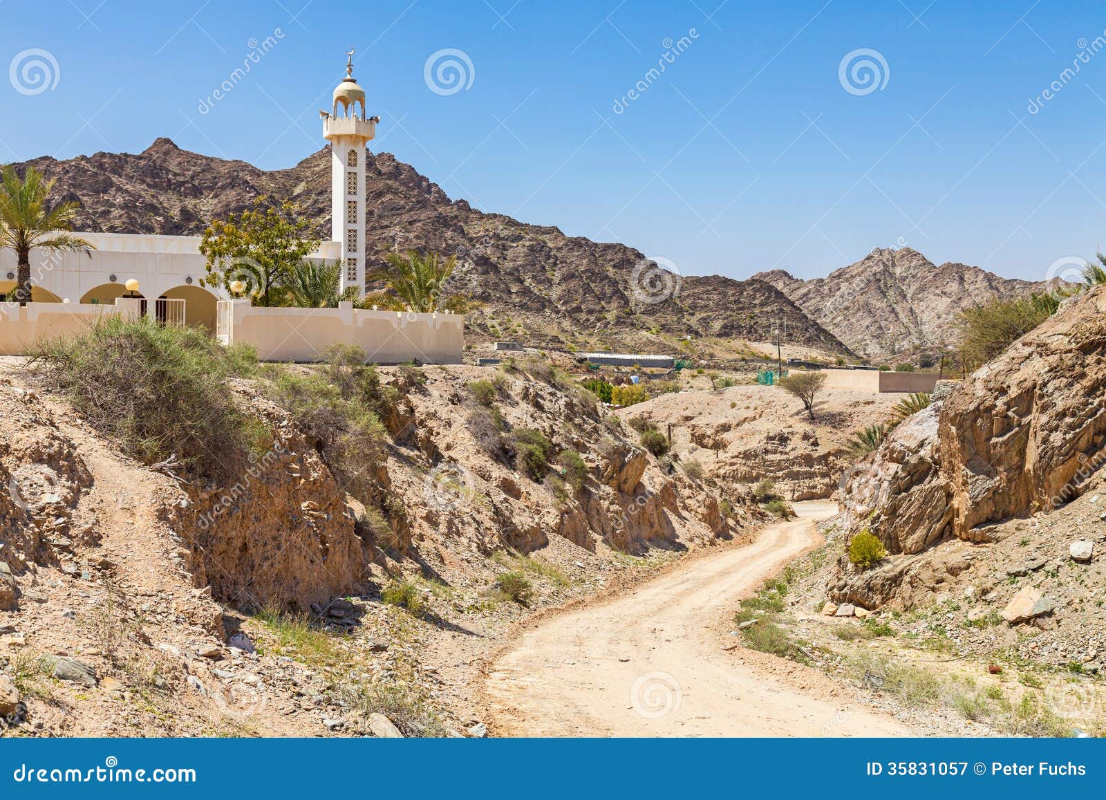 Oasis and Mosque stock image. Image of mountain, hills - 35831057