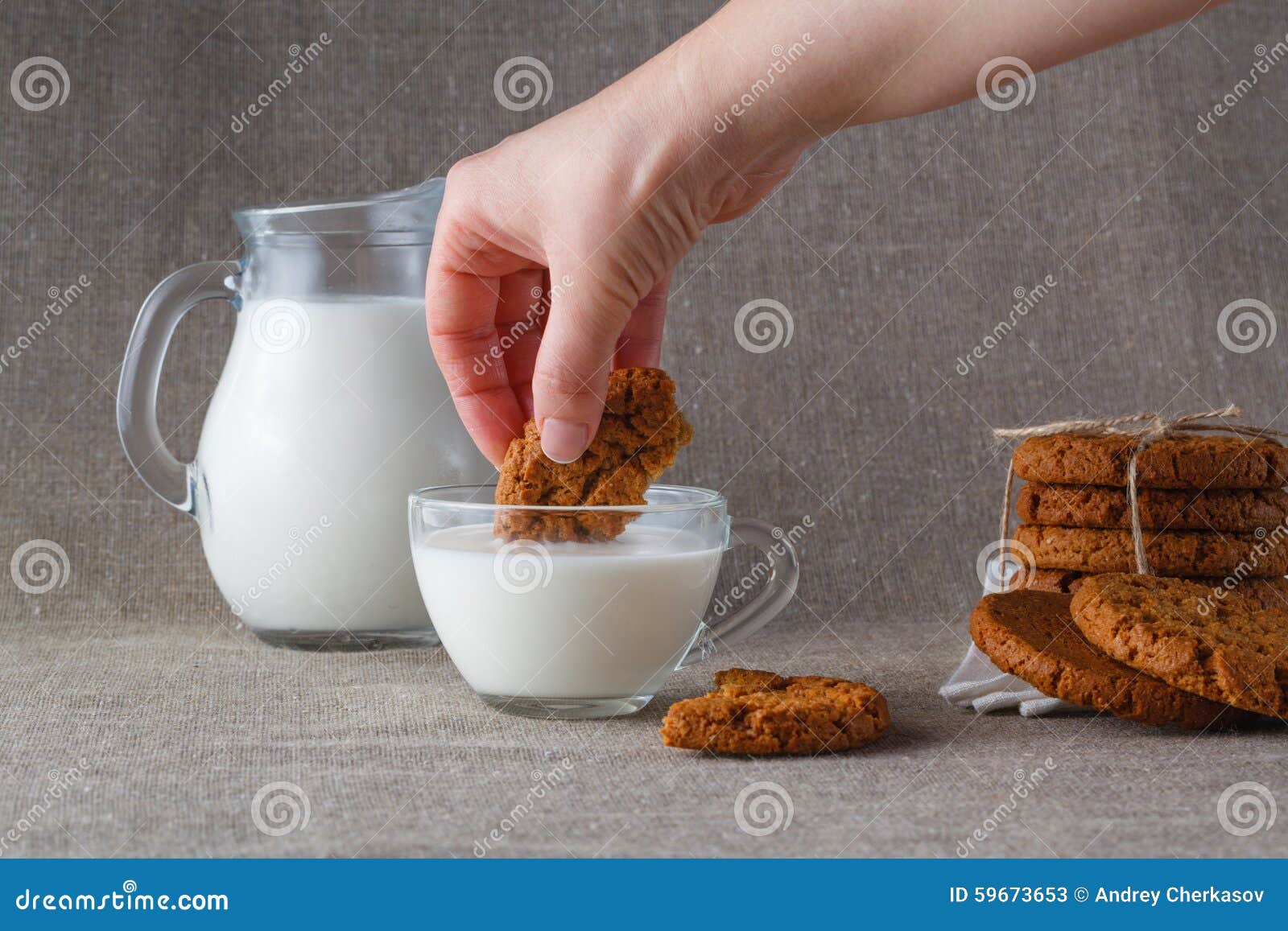 Oat cookies dunked in milk stock image. Image of snack - 59673653