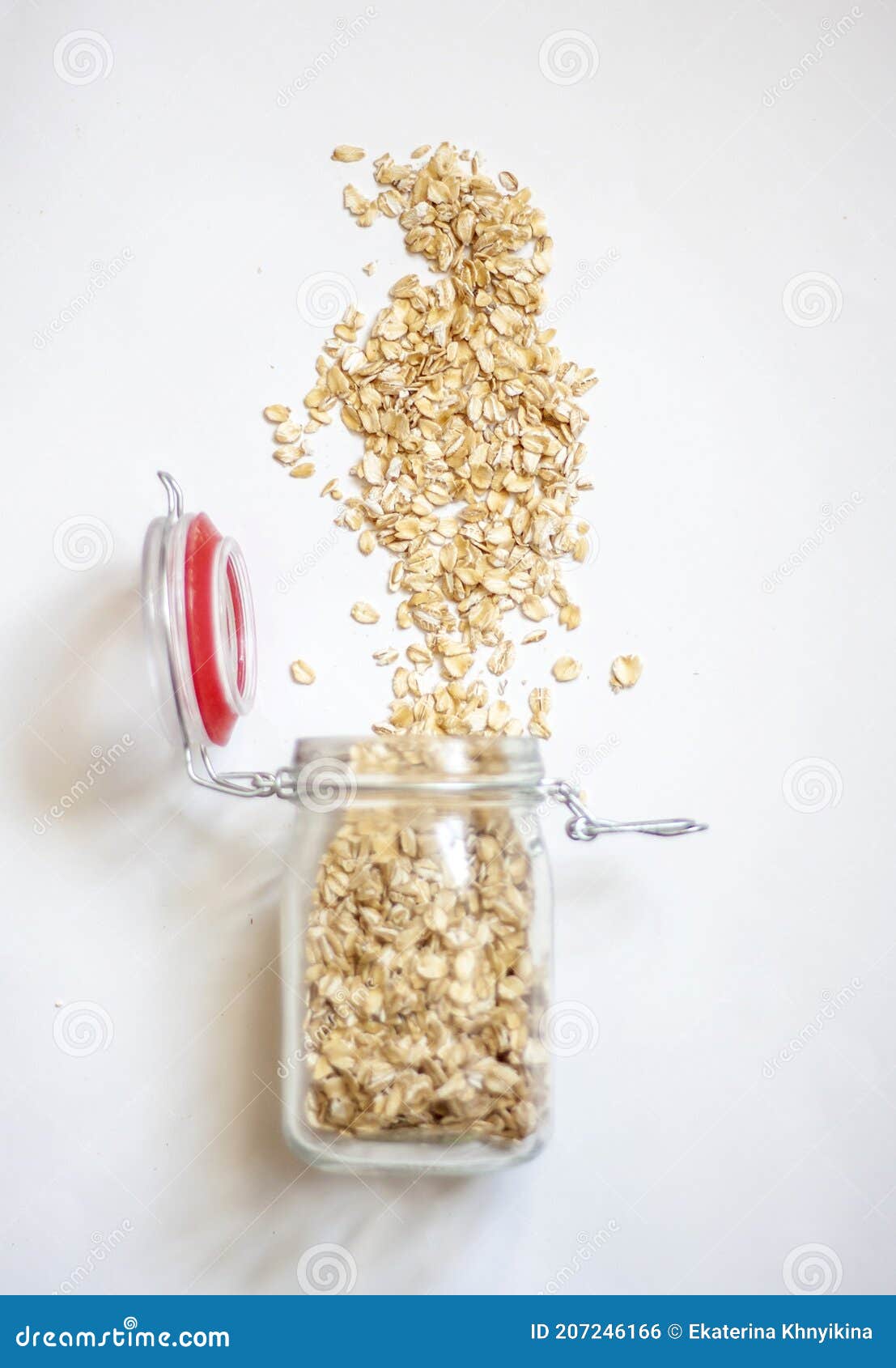 Oat Flakes Spilled Out of the Jar, Isolated on a White Background, Flat ...