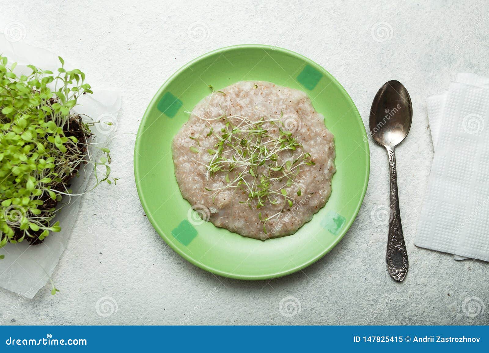 Oat Porridge with Micro-green on the Plate. a Healthy Nutritious ...