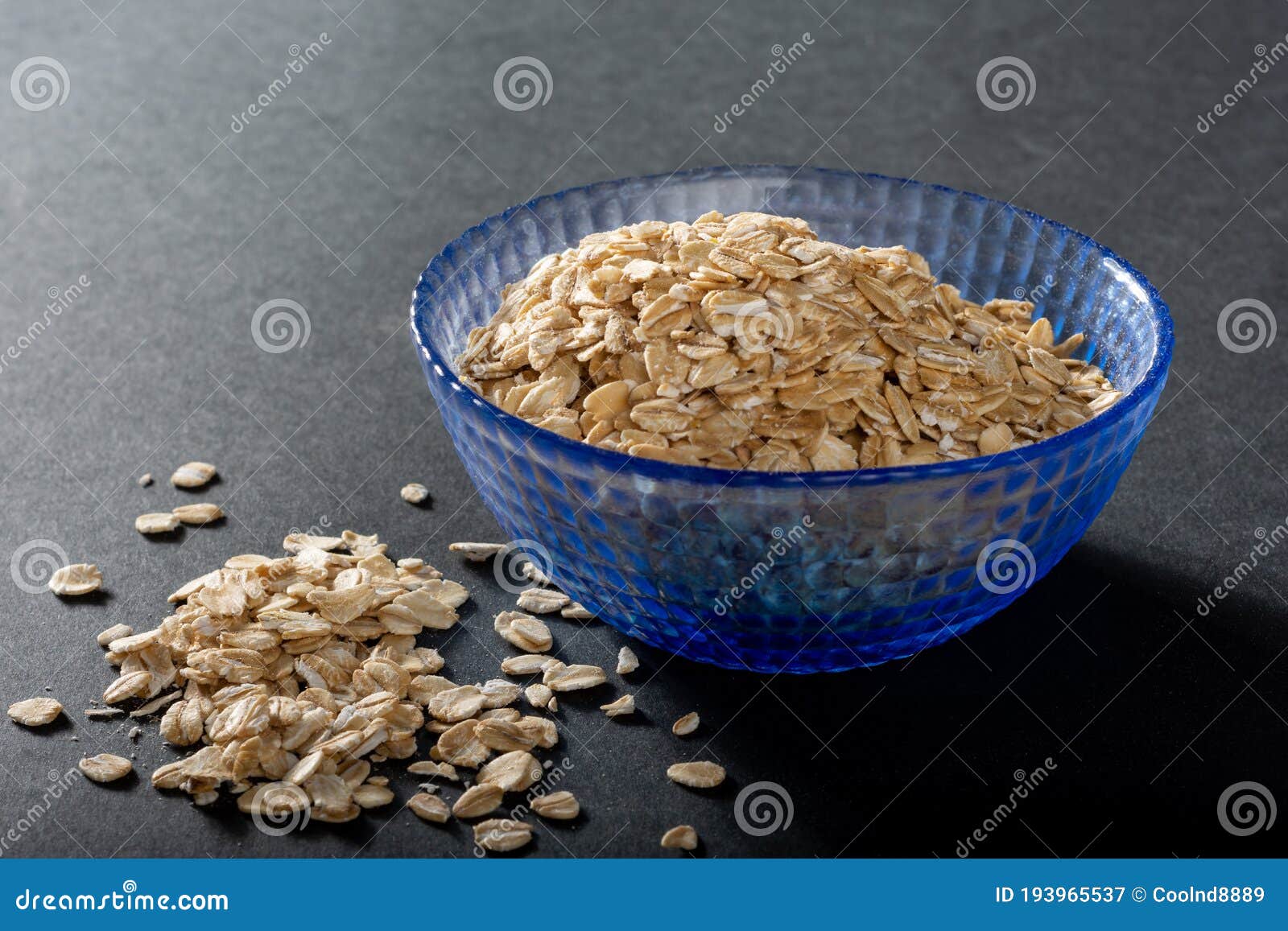 Oatmeal in a Blue Cup on a Black Background. Stock Image - Image of ...