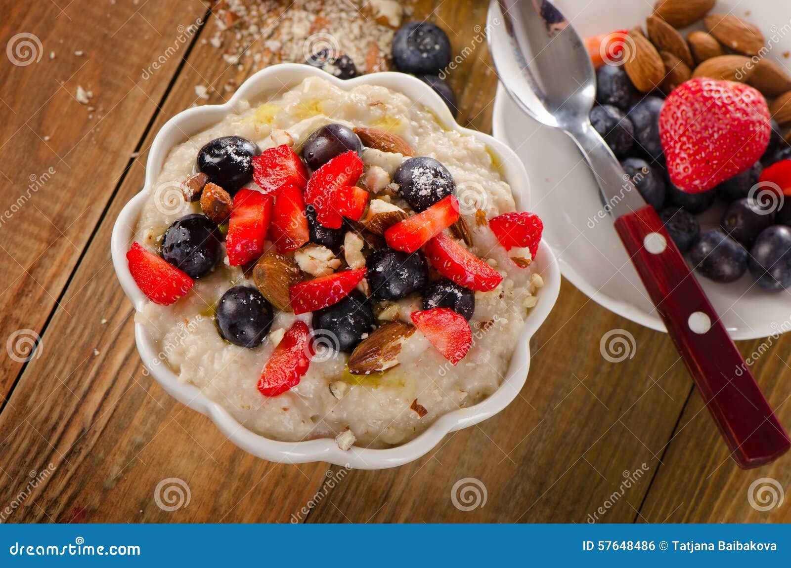 Oatmeal with Fresh Berries and Nuts for Healthy Breakfast. Stock Photo ...