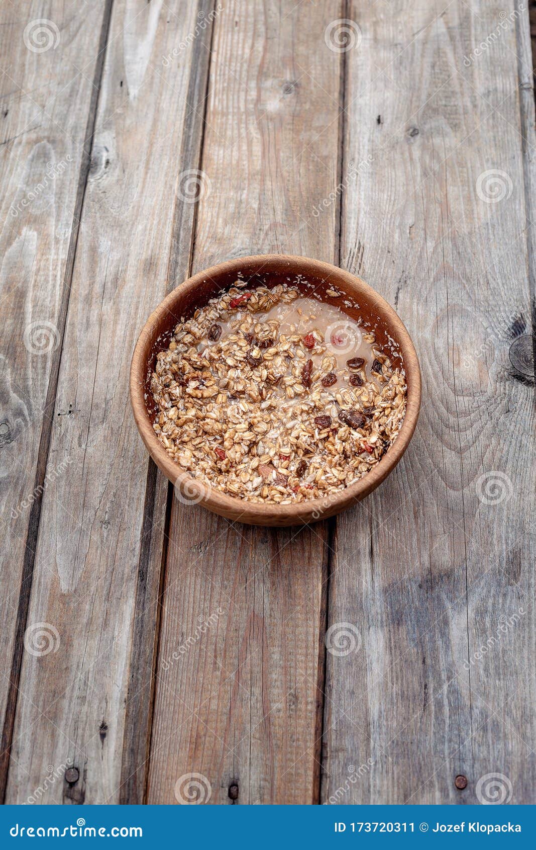 Oatmeal on the Table. Oatmeal in Brown Bowl on Old Wooden Table. Stock ...