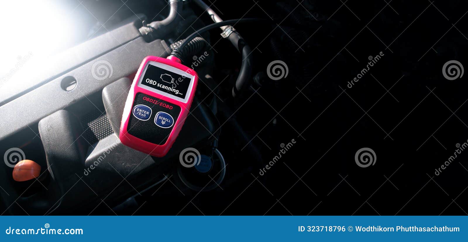 OBD2 or OBD Scanner Tool on Car Engine Compartment for Engine System ...