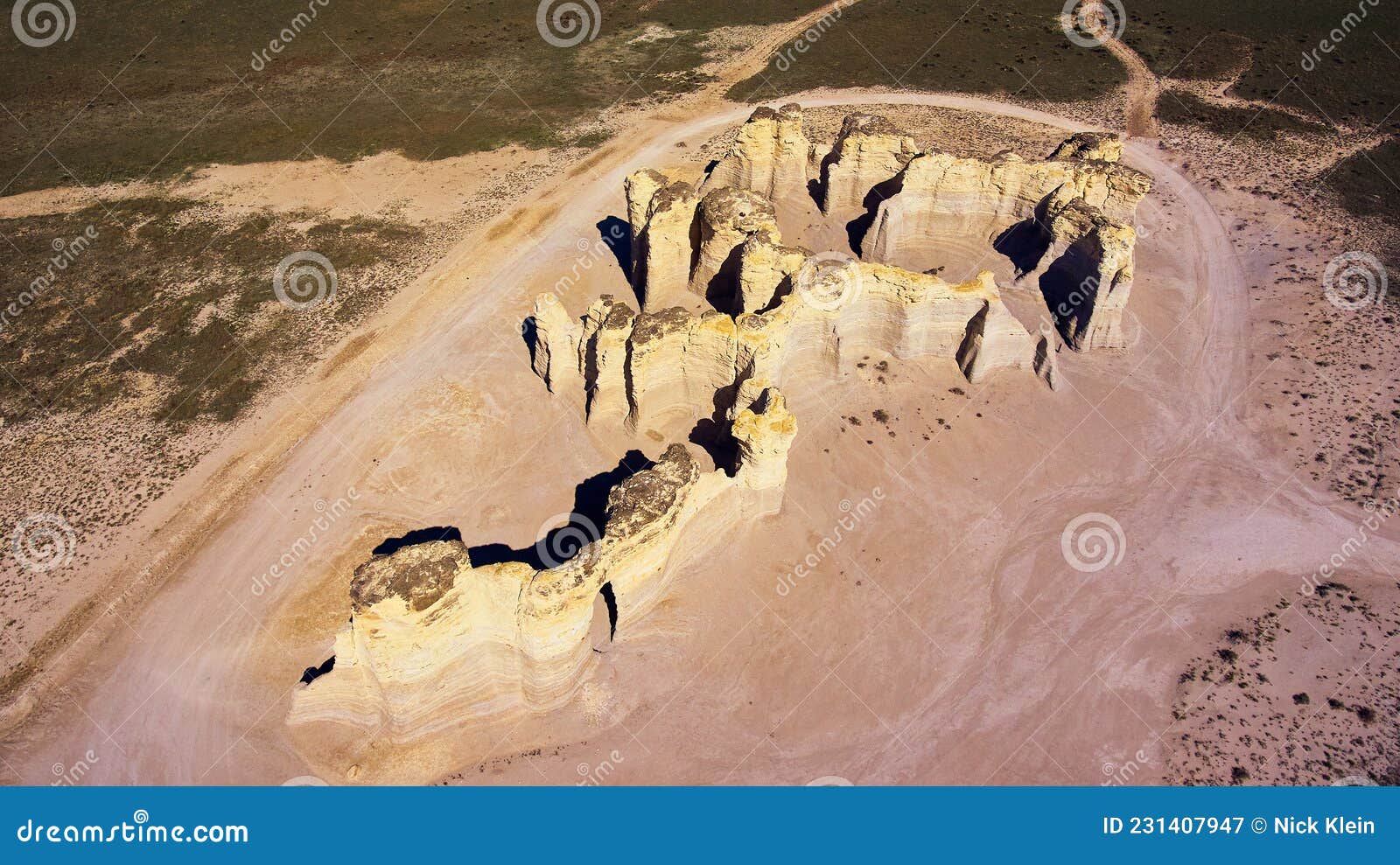 Obelisk Rock Structures Sticking Out of Flat Desert Region Stock Image ...
