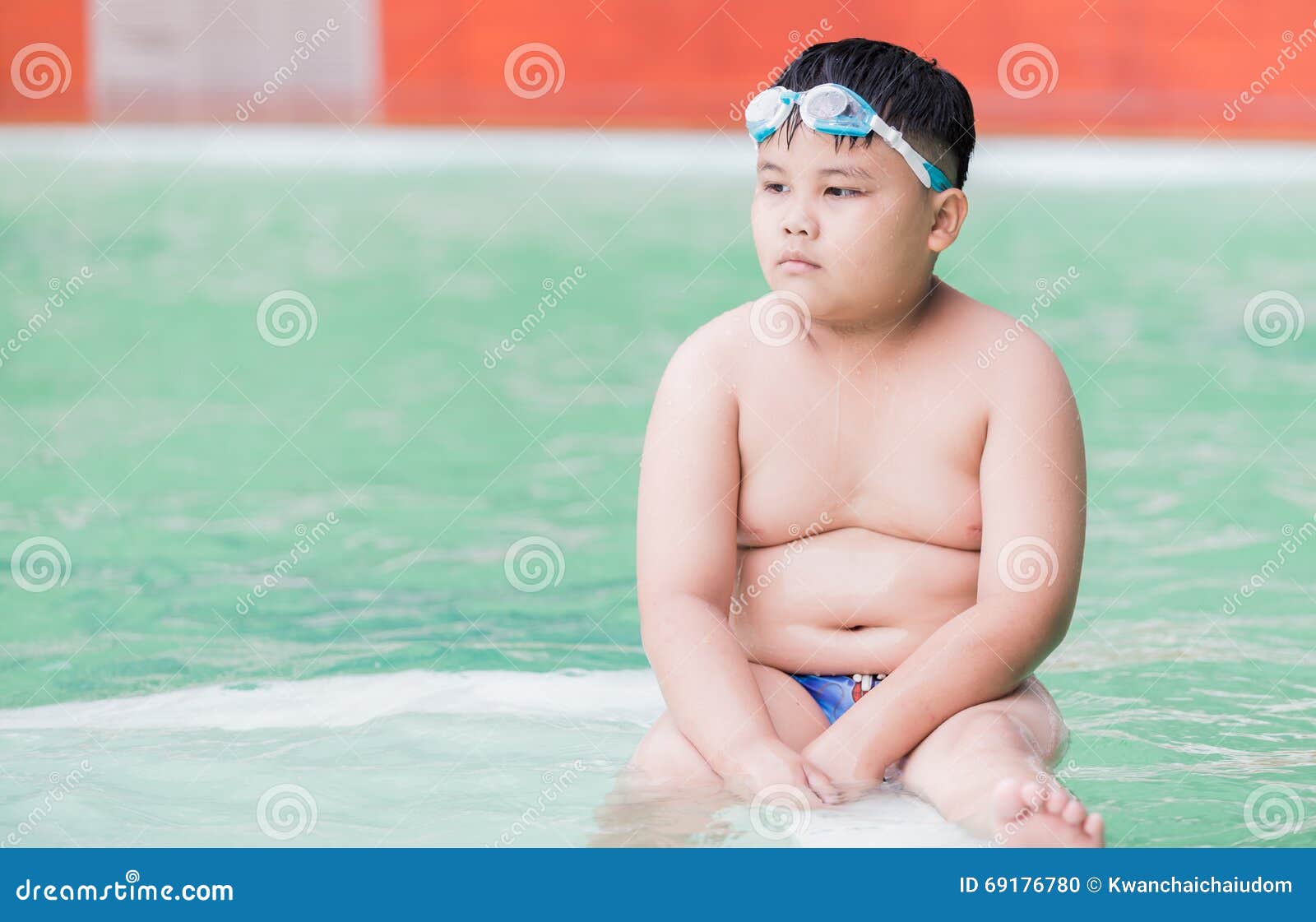 Obese Boy Sit in Swimming Pool Stock Photo - Image of pool, swimwear ...
