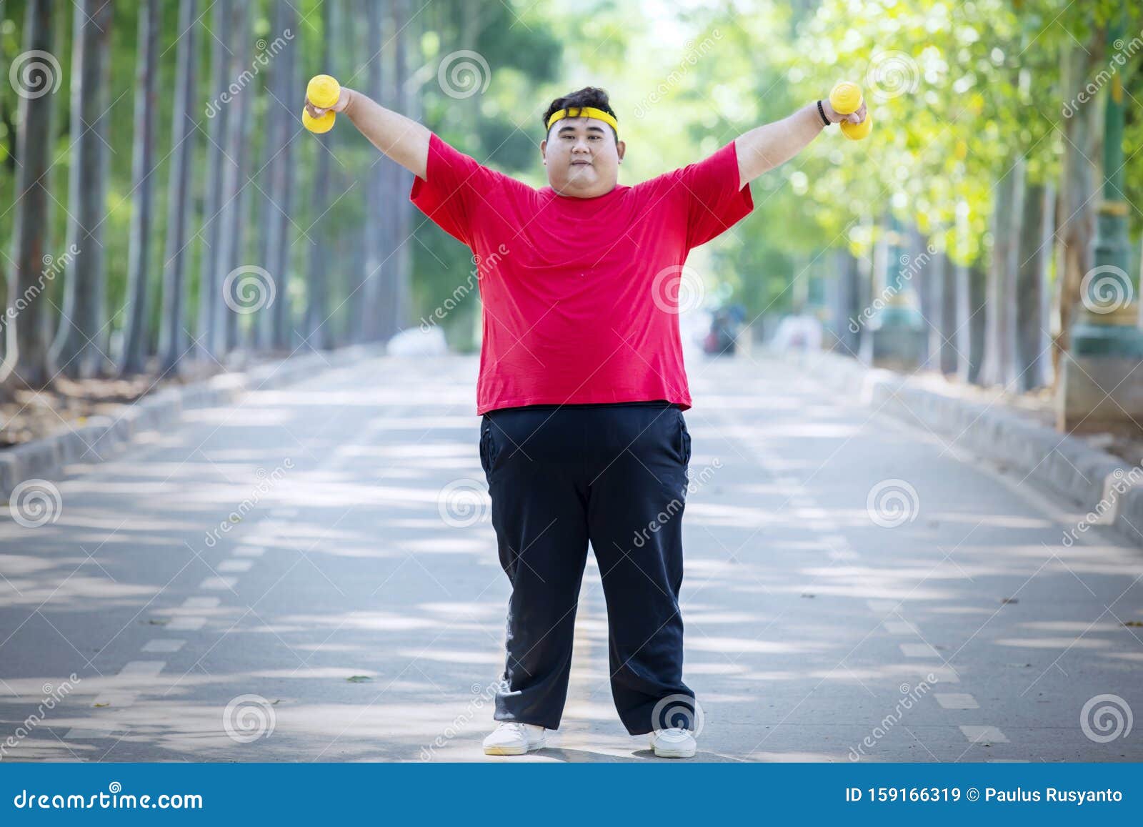 Obese Man Exercising with Dumbbells in the Park Stock Image - Image of ...