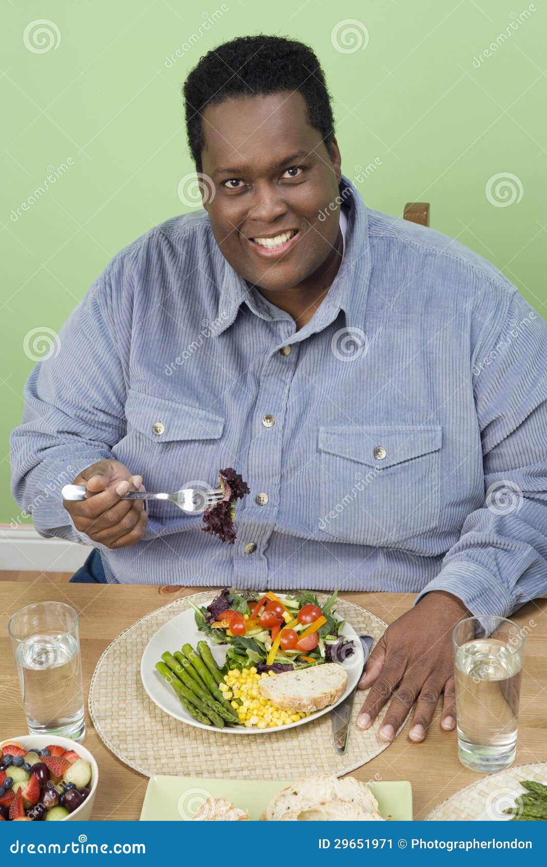 An Obese Man Having Food stock image. Image of african - 29651971
