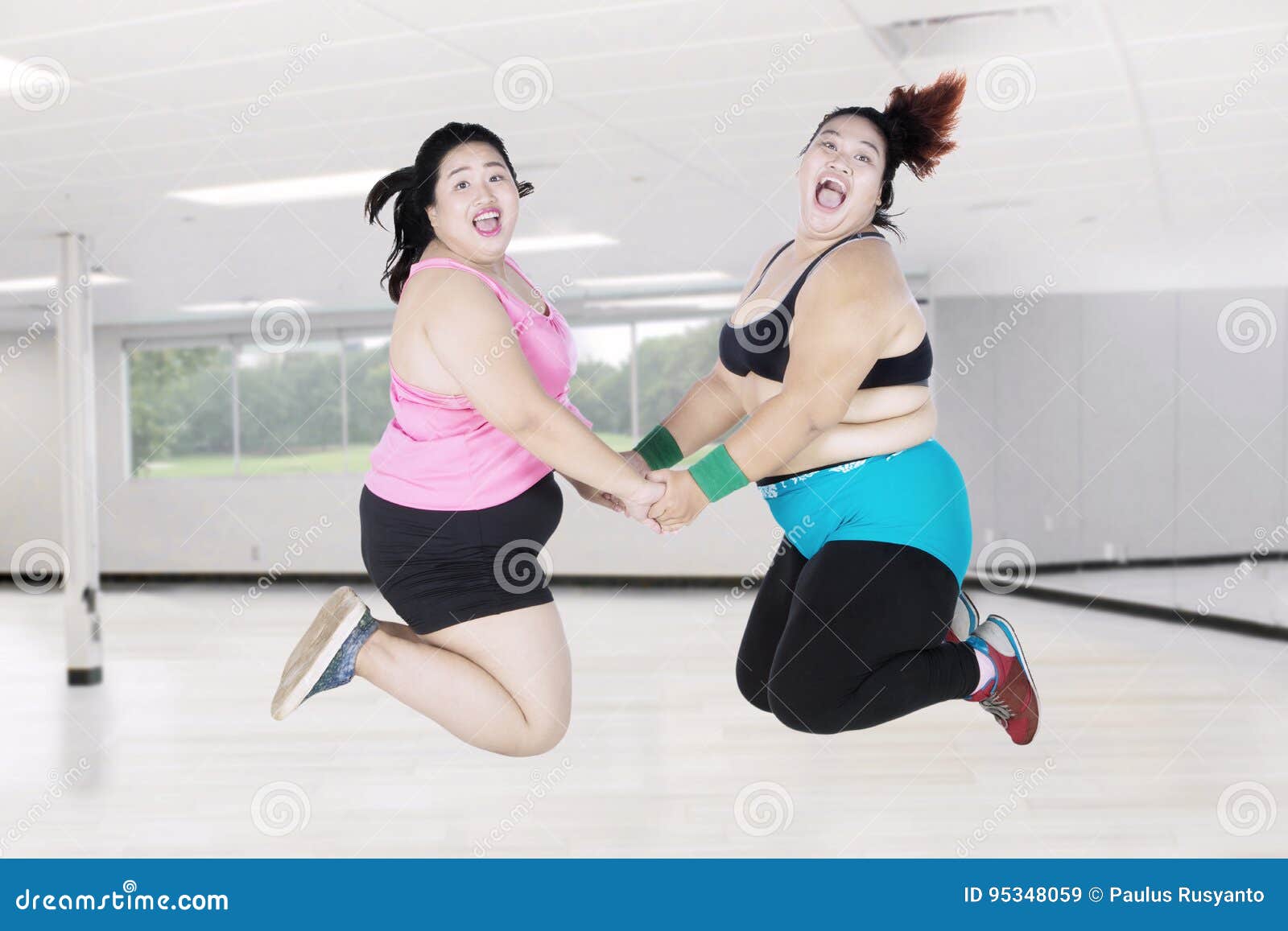 Obese Women Leaping Together in Gym Stock Image - Image of overweight ...
