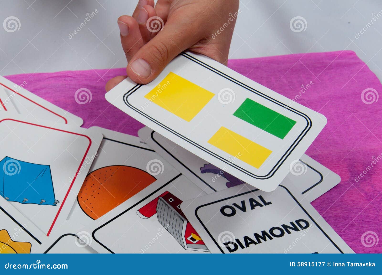 Object cards in hand stock image. Image of blue, orange - 58915177