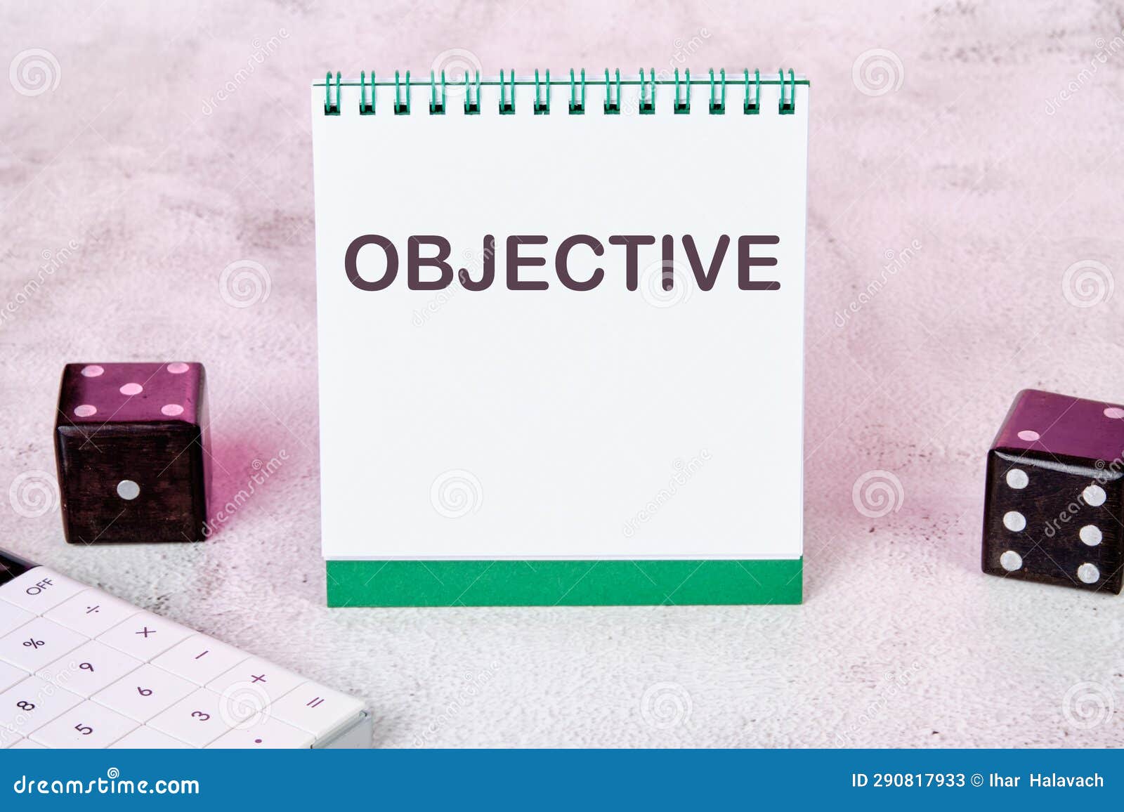 OBJECTIVE Text on a White Notepad Sheet Next To Dice on an Abstract ...