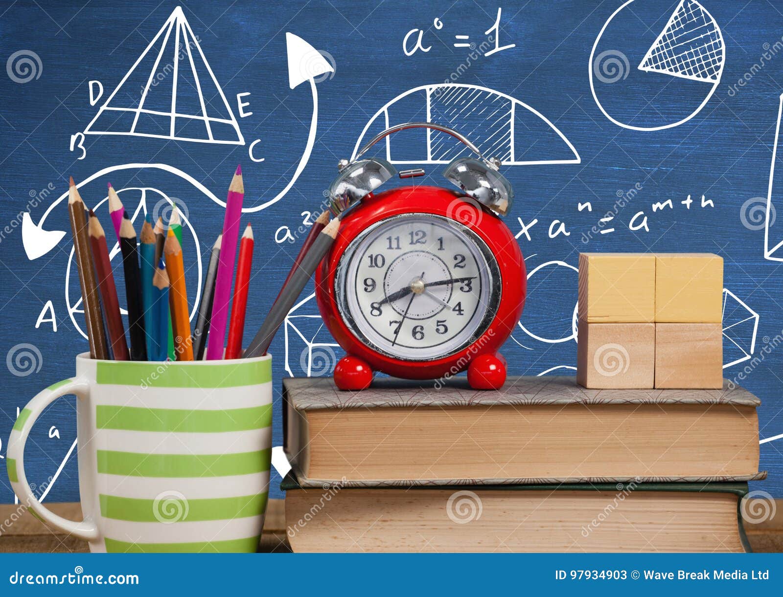 Objects on Desk Foreground with Blackboard Graphics of Math Equations ...