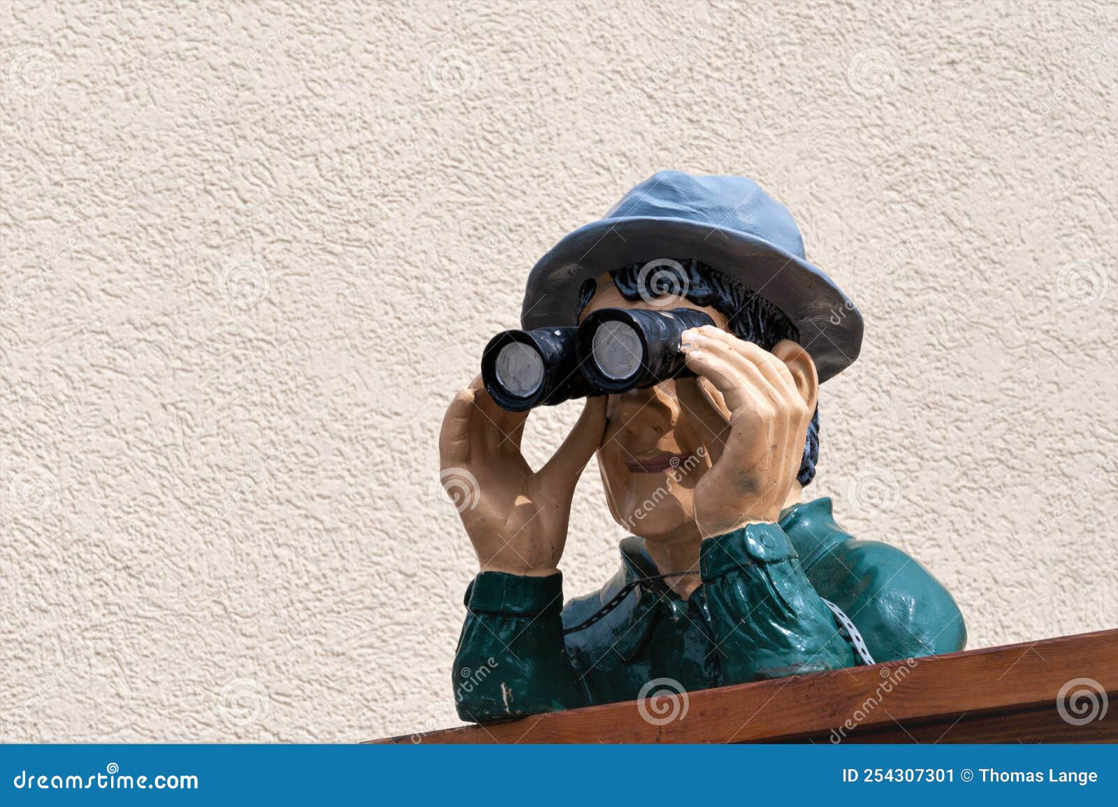 An Observer with a Binoculars is Looking into the Distance Stock Image ...