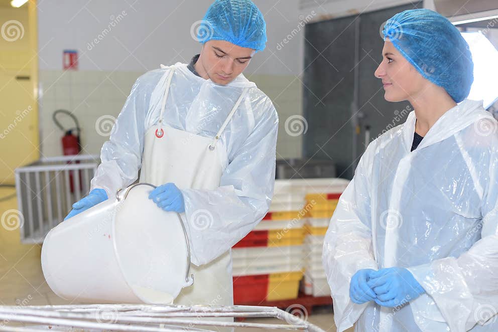 He observing colleague stock image. Image of production - 245862501