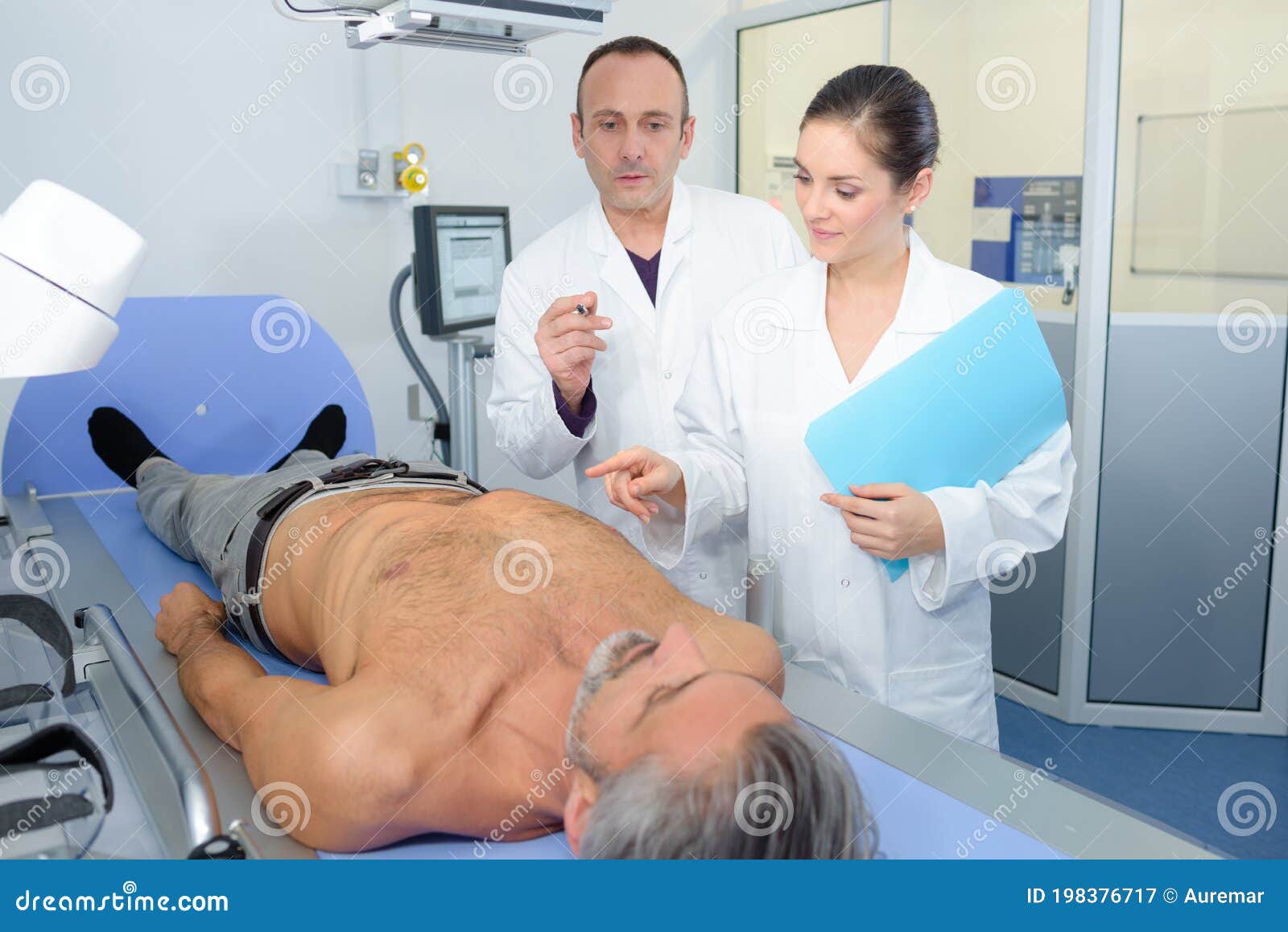 He observing patient stock image. Image of worker, teamwork - 198376717