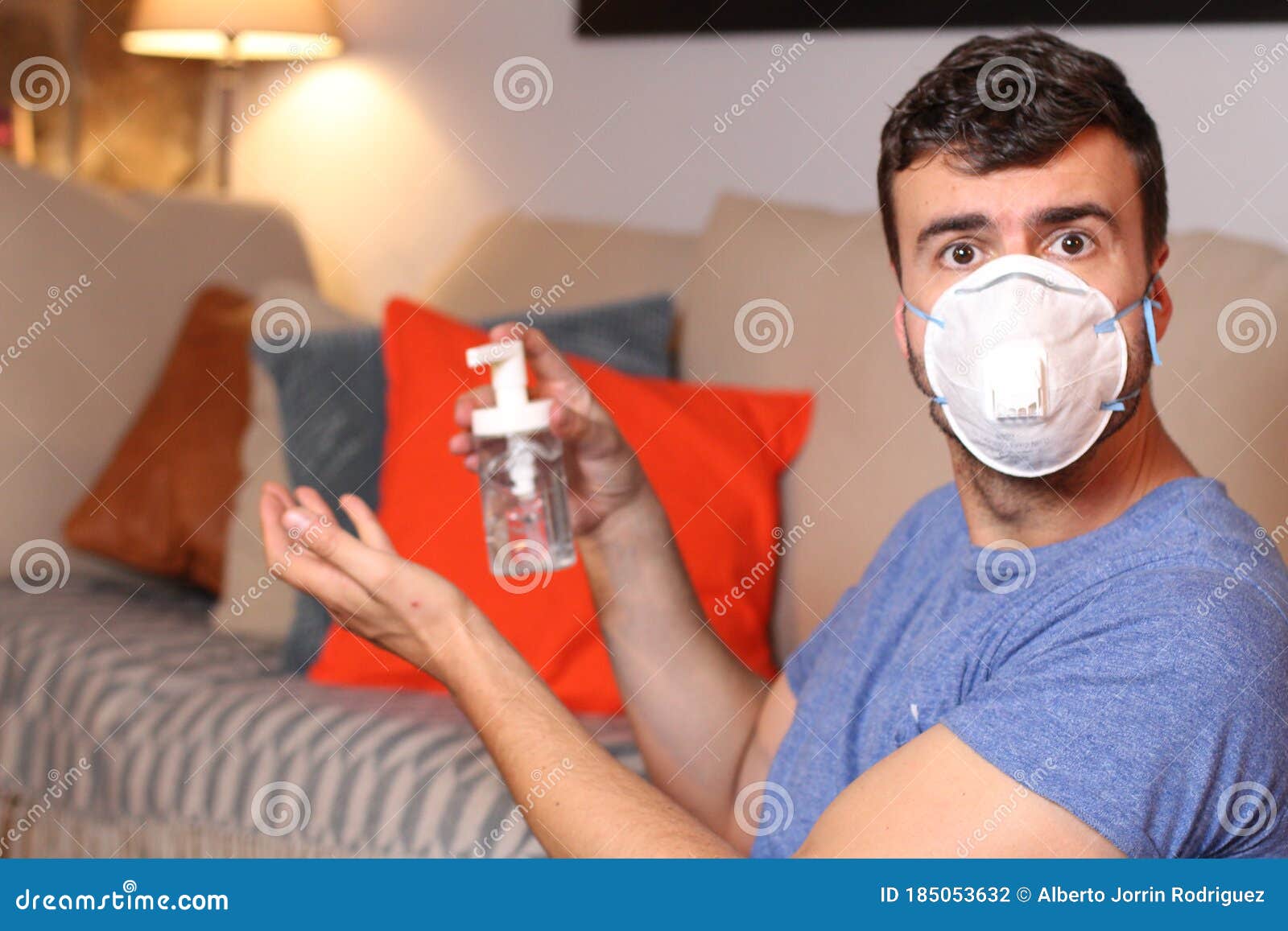 Obsessive Man Using Hand Sanitizer Stock Photo - Image of disease, mask ...