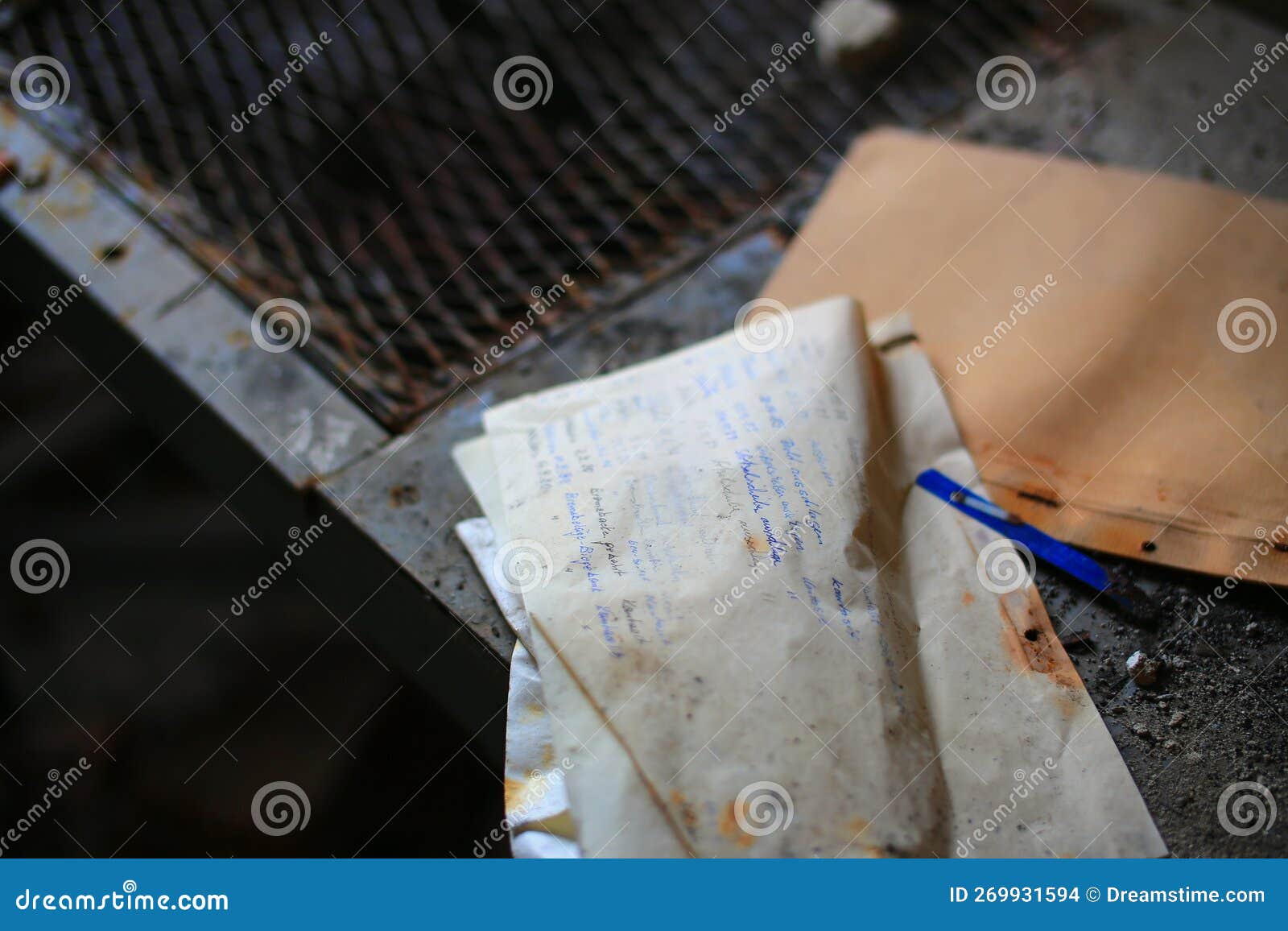 Obsolete Torn Folder with Handwritten Notes on Work Documentation in ...