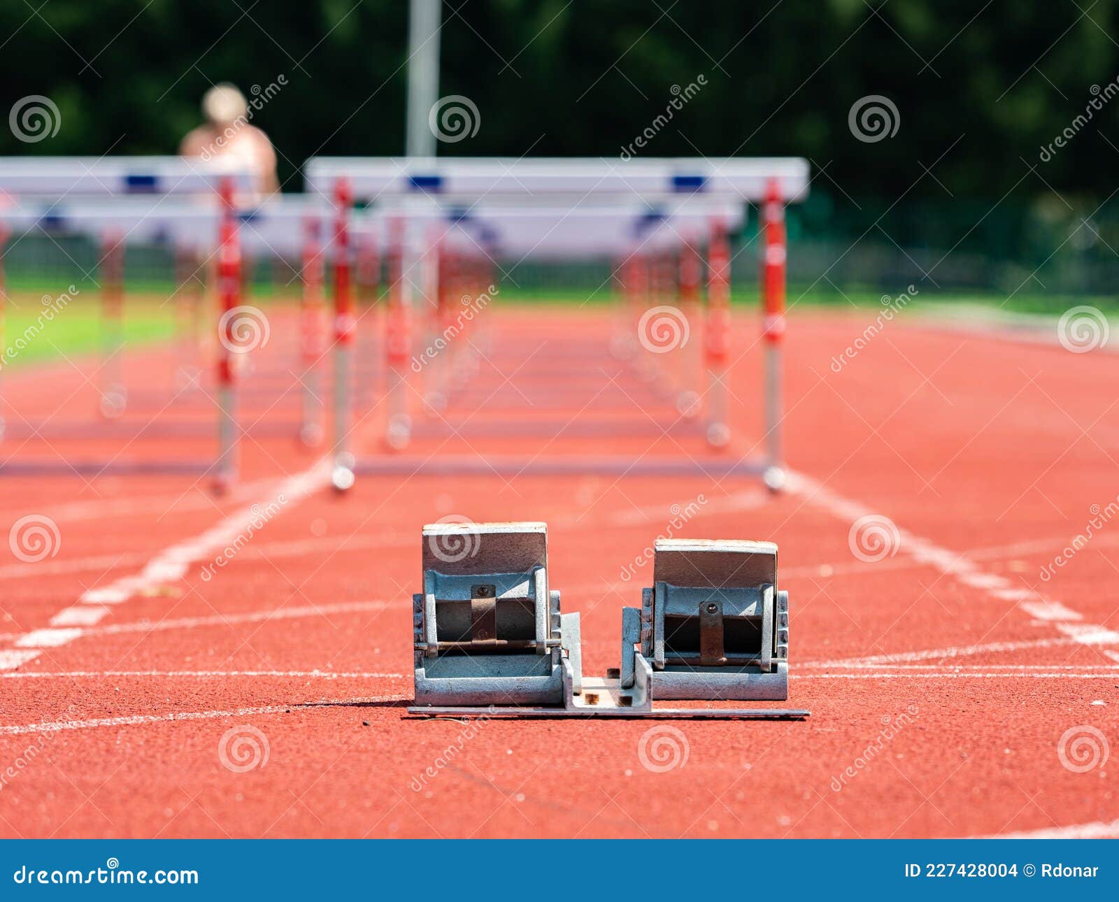 Obstacle Course Training. Athletics Starting Blocks and Red Running ...