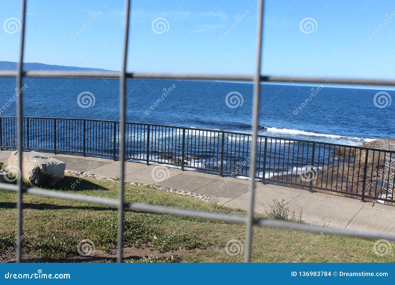 Obstructed view of the sea stock photo. Image of view - 136983784