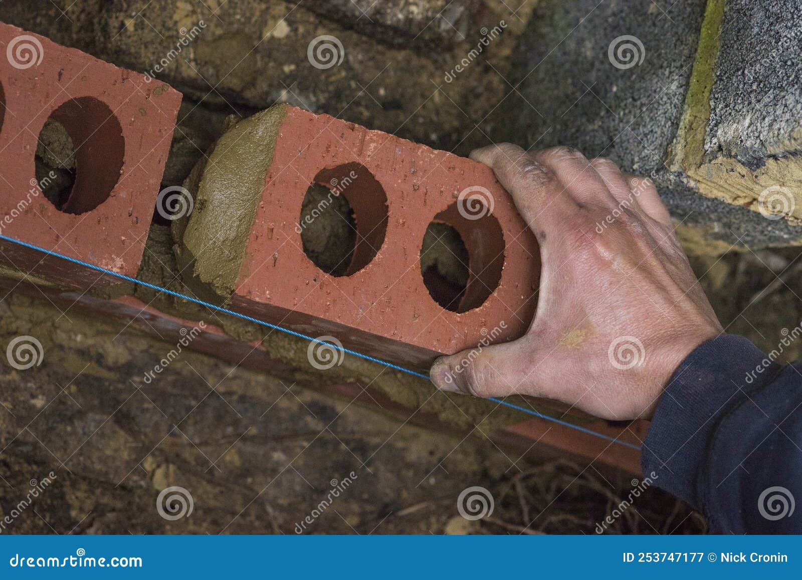 Occupation: Bricklayer Placing a Brick - Construction Industry. 2 Stock ...