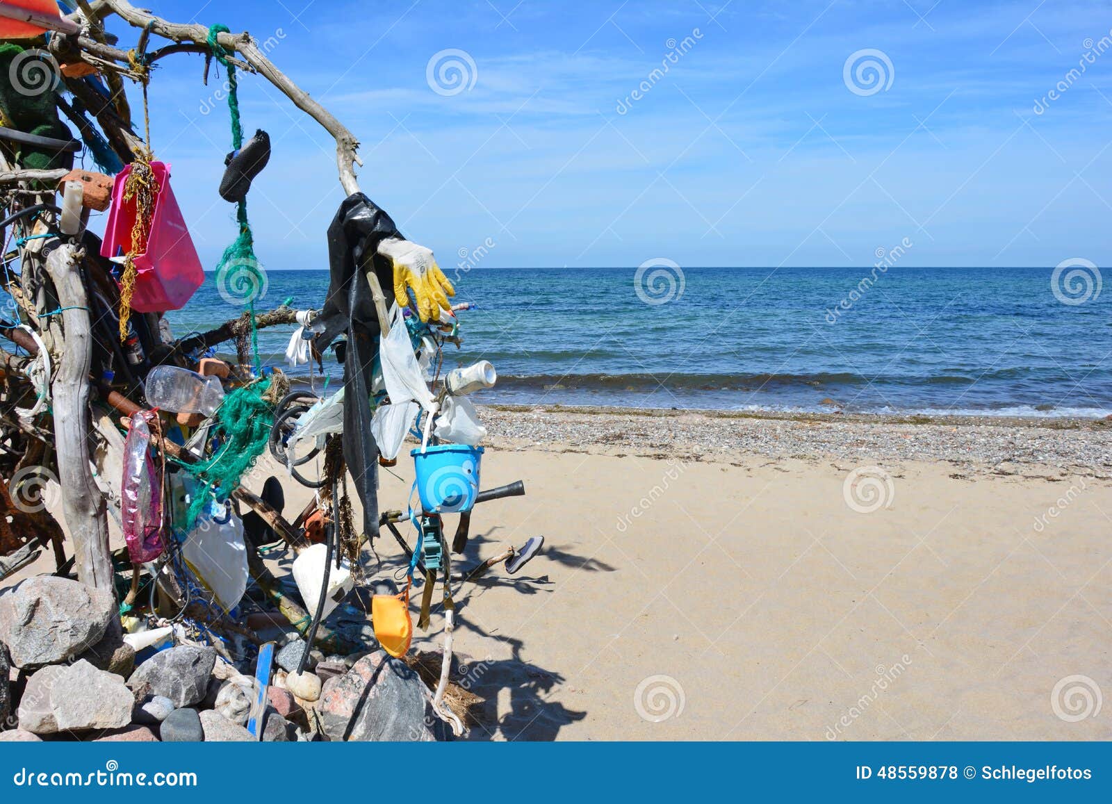 Beach Pollution With Garvage And Trash On The Beach Causing Damage To ...