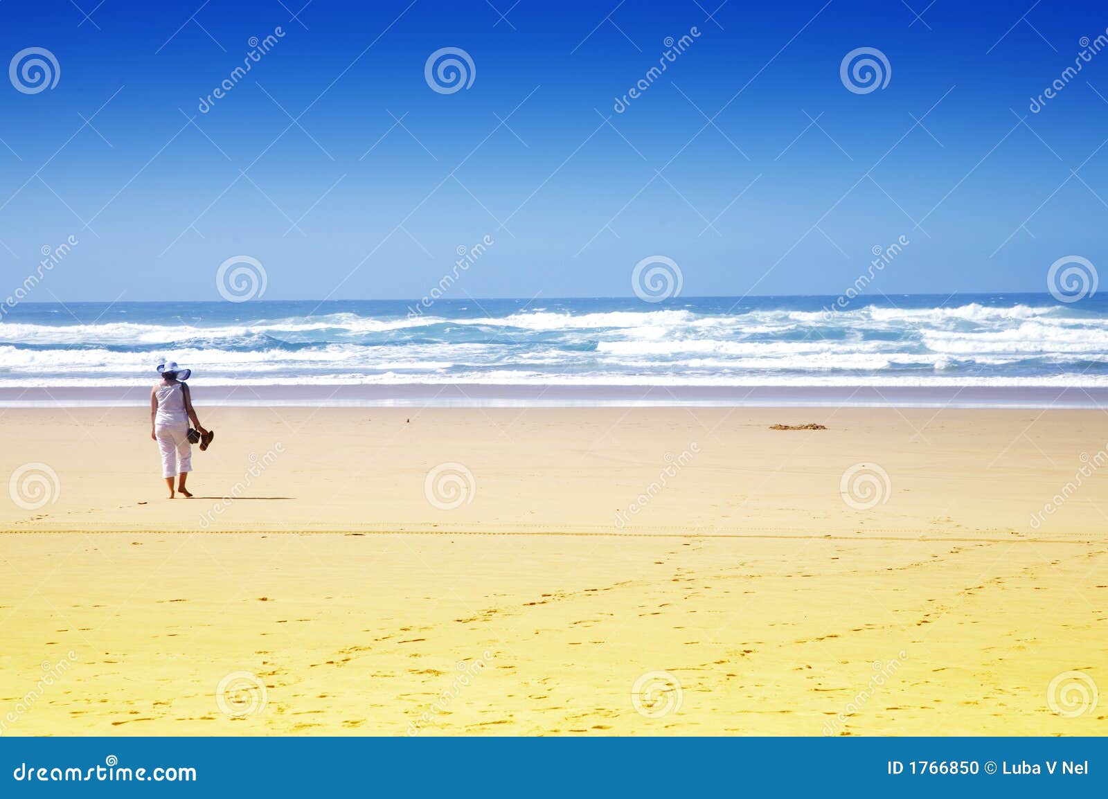 Ocean beach with a woman stock photo. Image of beach, shore - 1766850
