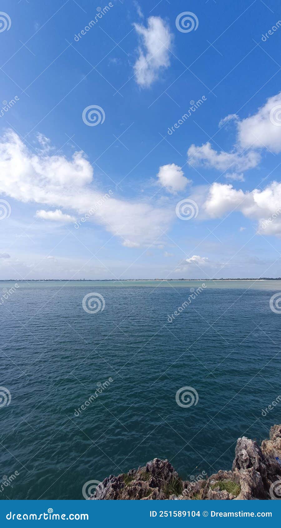 The Ocean and Bright Blue Sky from Cliff Stock Photo - Image of ...