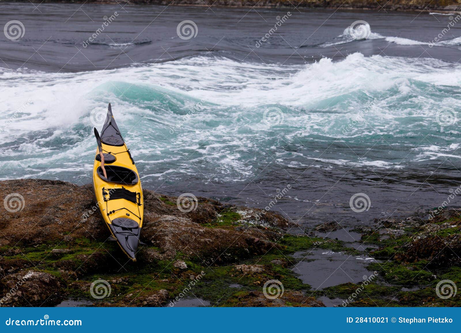 Ocean Kayak Beached on Rocky Shore at Tidal Rapids Stock Image - Image ...