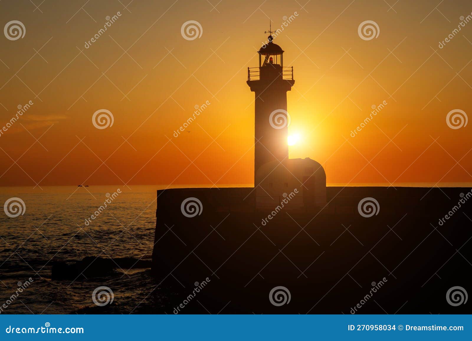 Ocean Lighthouse at the Sunset. Stock Photo - Image of evening, beach ...