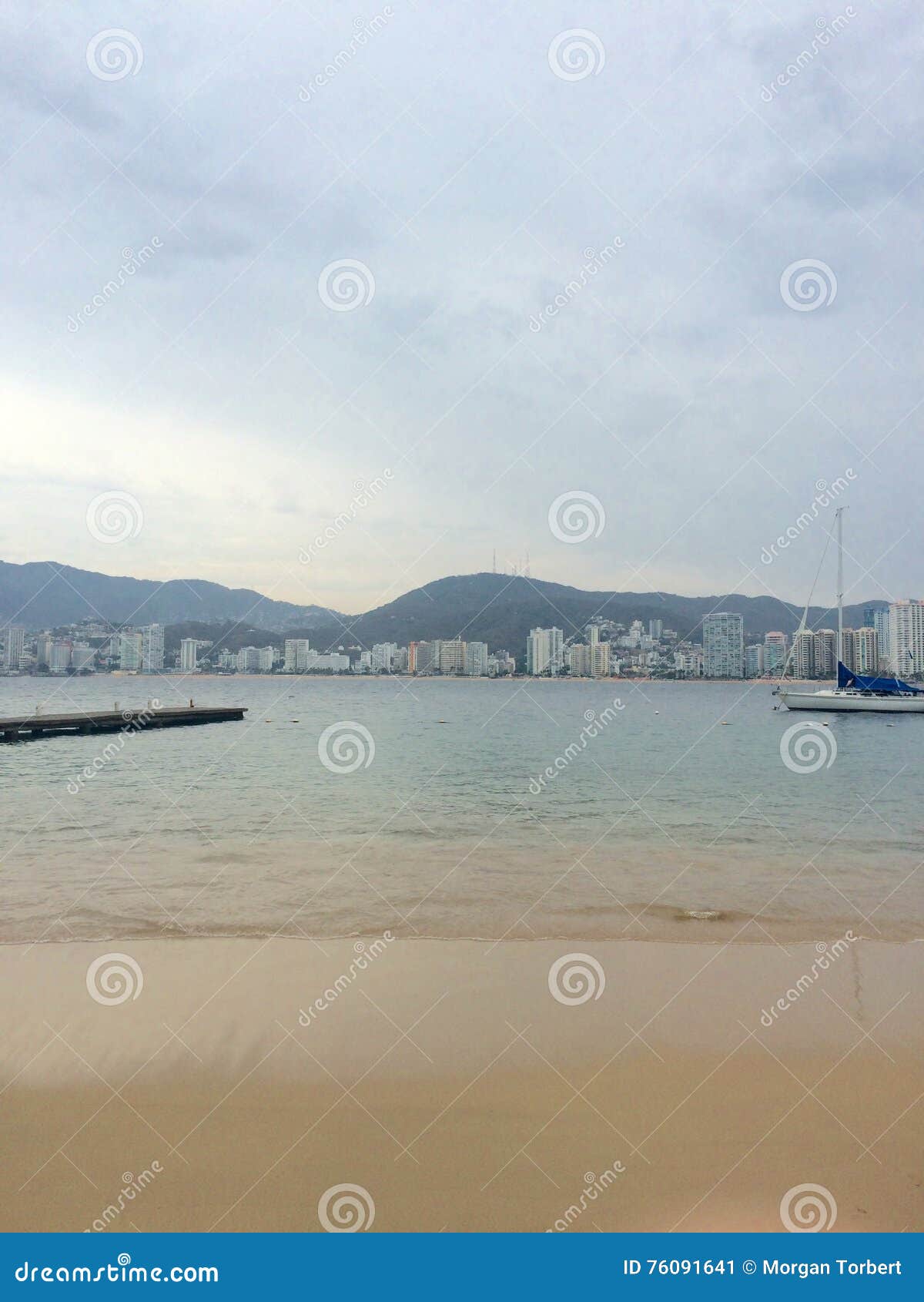 The Ocean Meets the Sand stock image. Image of sandy - 76091641