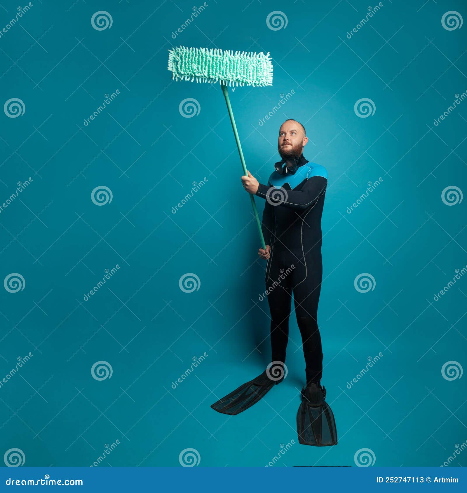 Ocean Pollution and Environmental Protection Concept. Diver with Mop on ...
