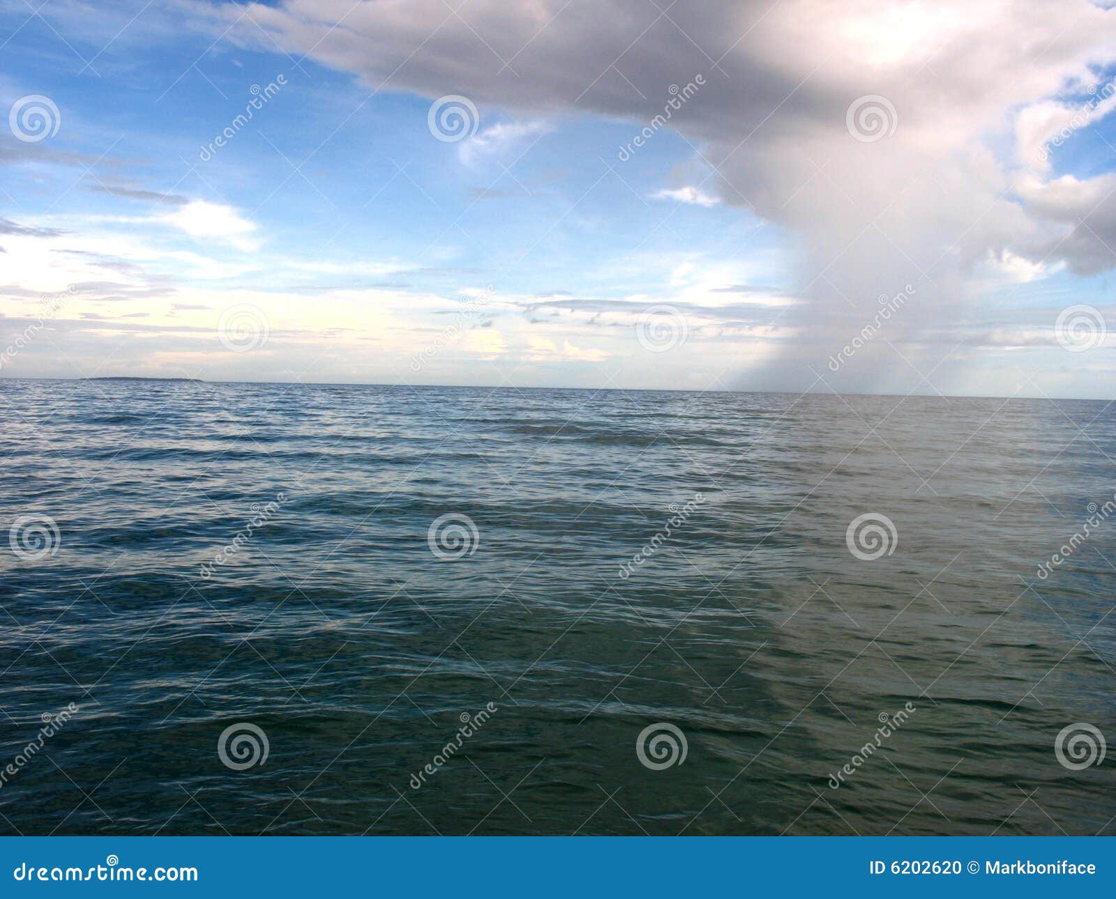 Ocean Rain stock photo. Image of clouds, blue, rain, skies - 6202620