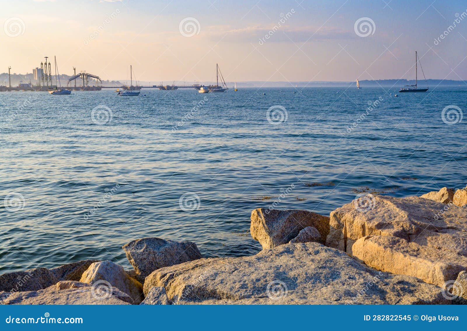 Ocean Rock Landscape with Blue Water and Sky with Ships on Background ...