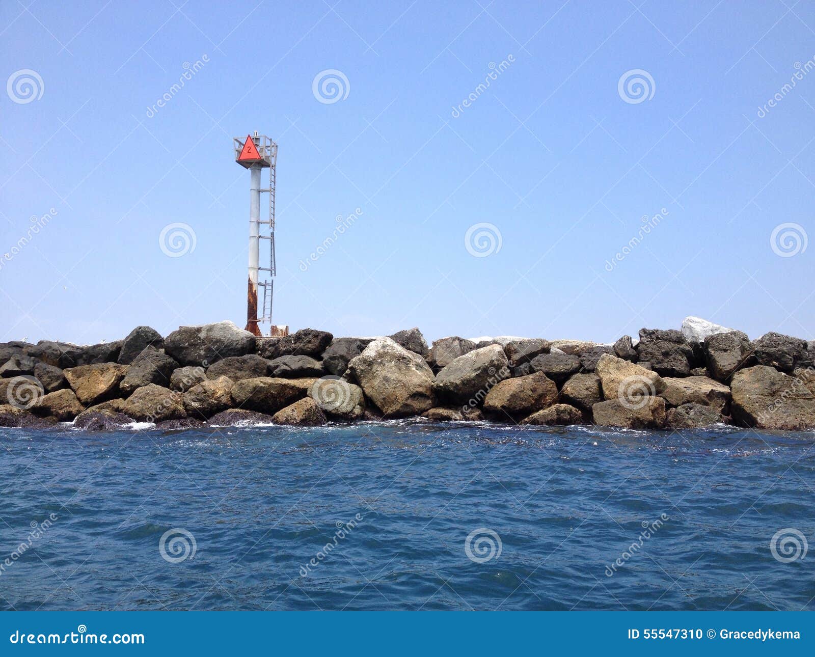 Ocean and rock wall stock photo. Image of tower, wall - 55547310