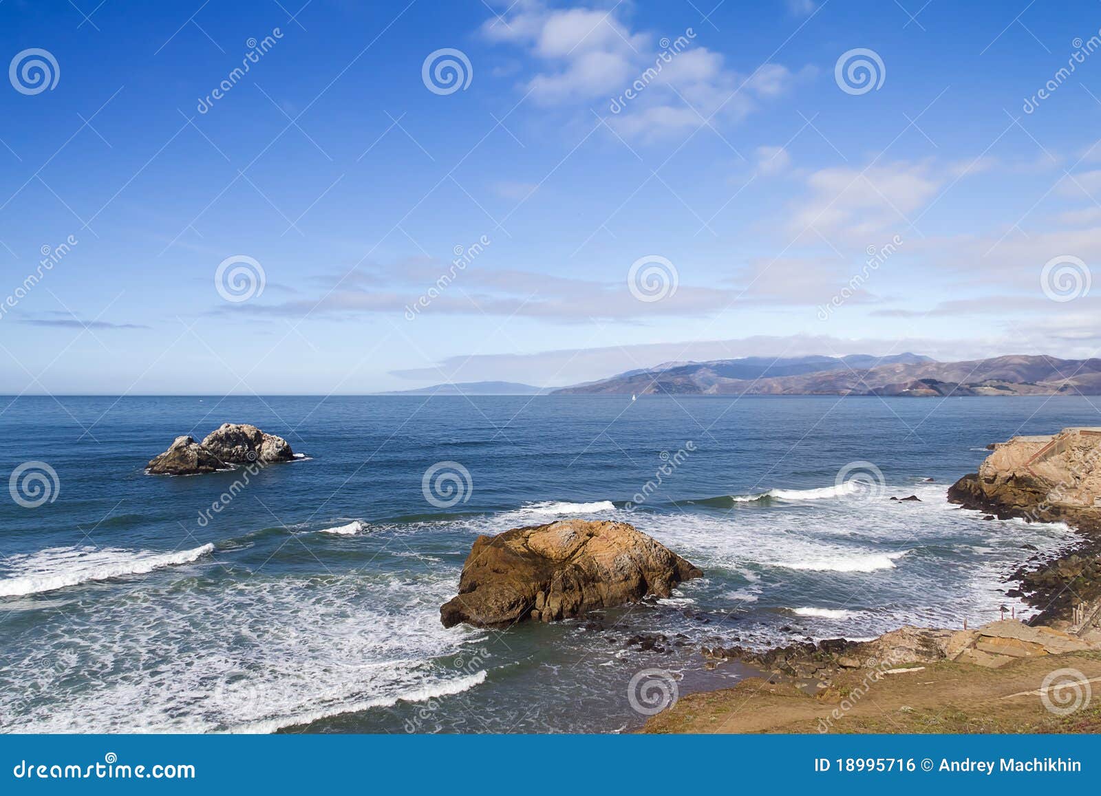 Ocean rocky shore stock photo. Image of ocean, skies - 18995716