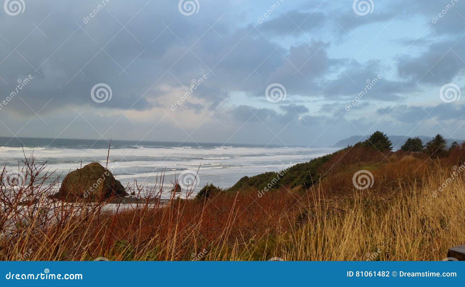 Ocean Scape stock photo. Image of point, rock, blue, dunes - 81061482