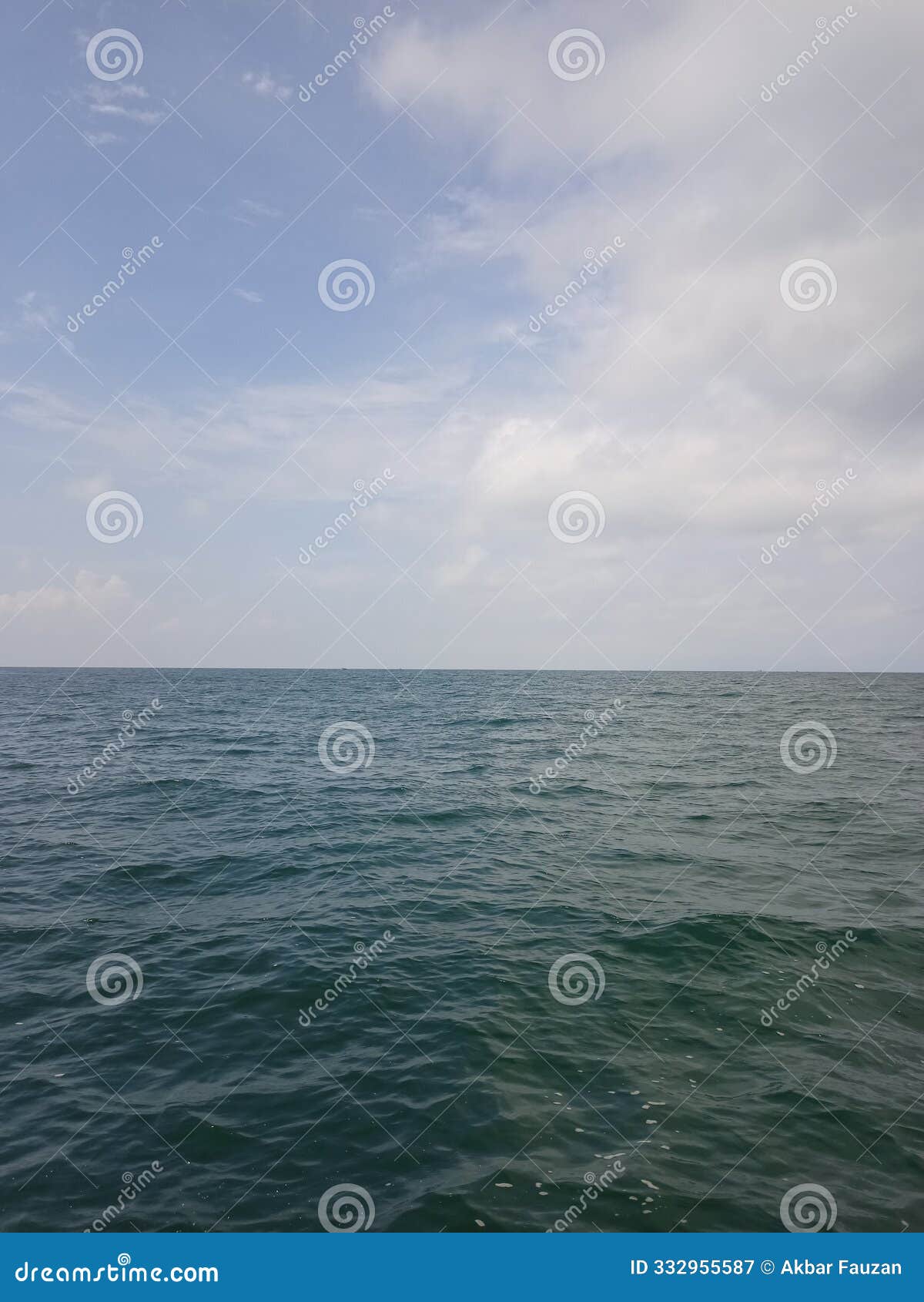 The Ocean and Sky are Separated by a Horizontal Line, a Combination of ...