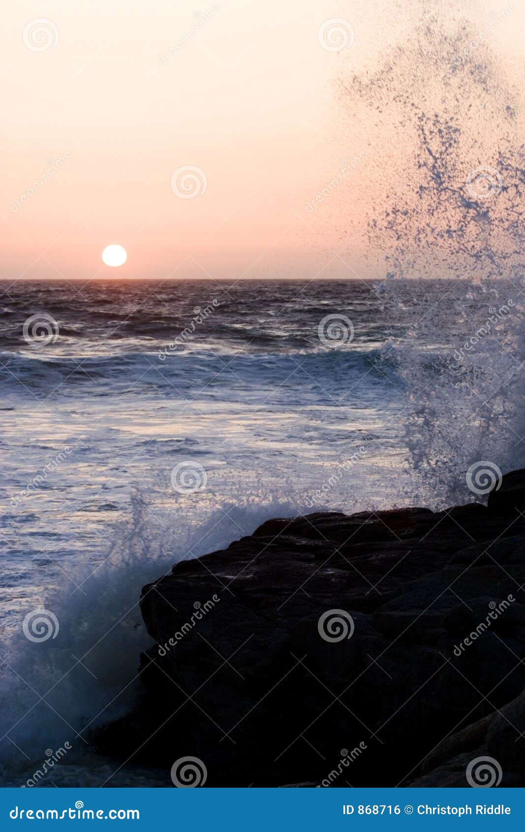 Ocean spray at sunset stock photo. Image of forceful, beach - 868716