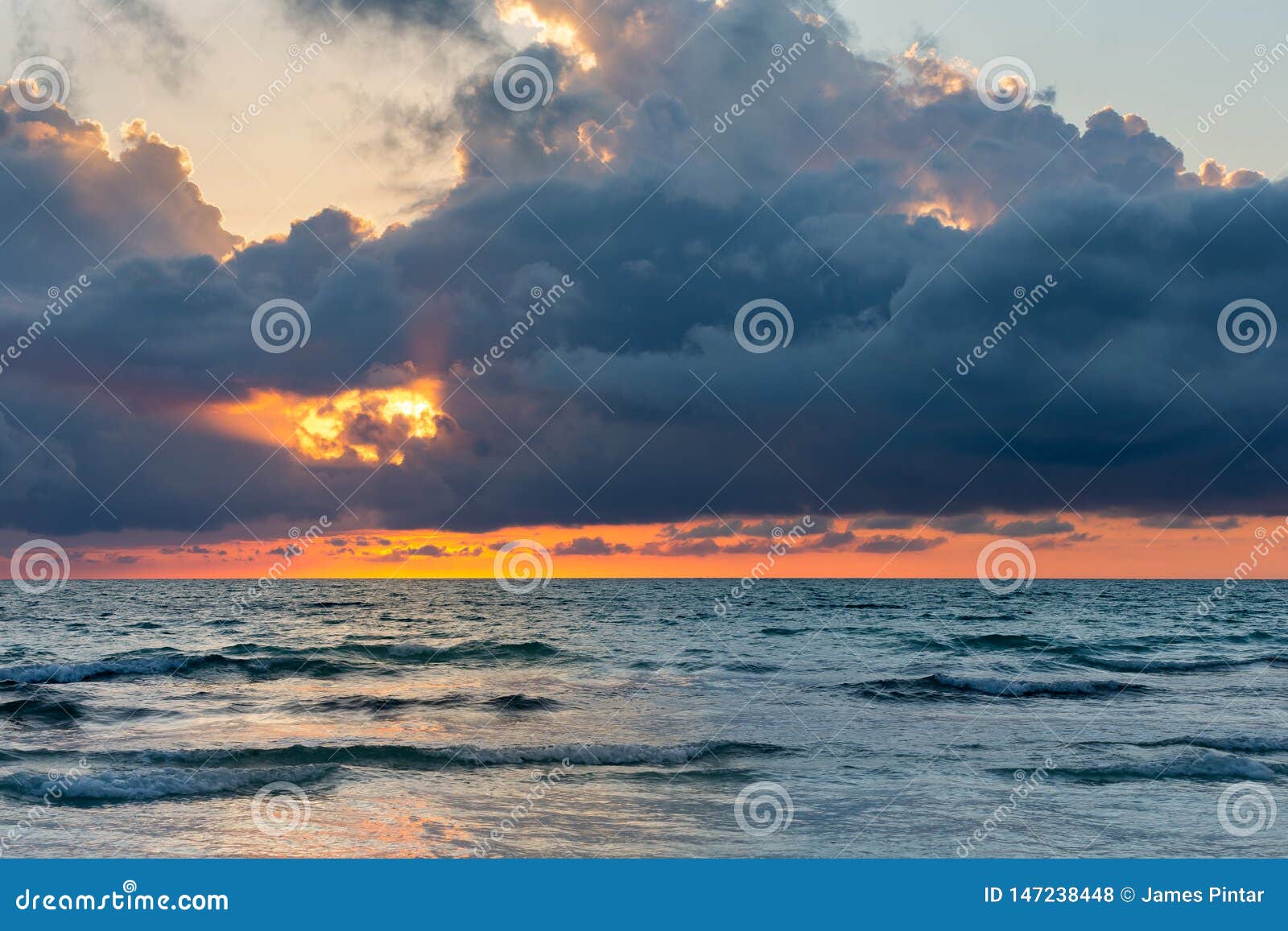 Ocean Sunset with Dramatic Dark Clouds Stock Photo - Image of ocean ...