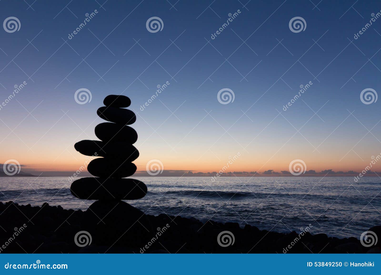 Ocean Sunset with Stacked Stone Silhouette Stock Photo - Image of ocean ...